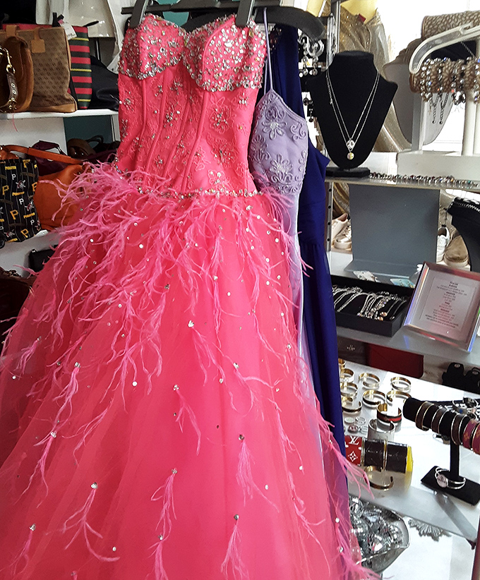 This showstopping pink gown with feathery details and crystal embellishments proves second-hand doesn't mean second-best in the glamour department.