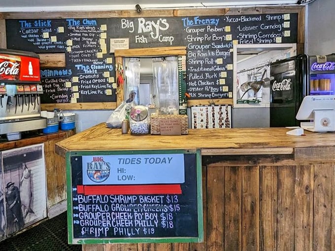 The heart of operations: where orders are placed, dreams are fulfilled, and the daily tide report reminds you of the source of your meal.