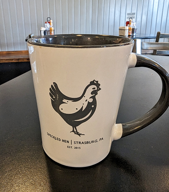 The kind of mug you'll be tempted to slip into your bag &ndash; branded with the iconic speckled hen that's become Strasburg's breakfast mascot.