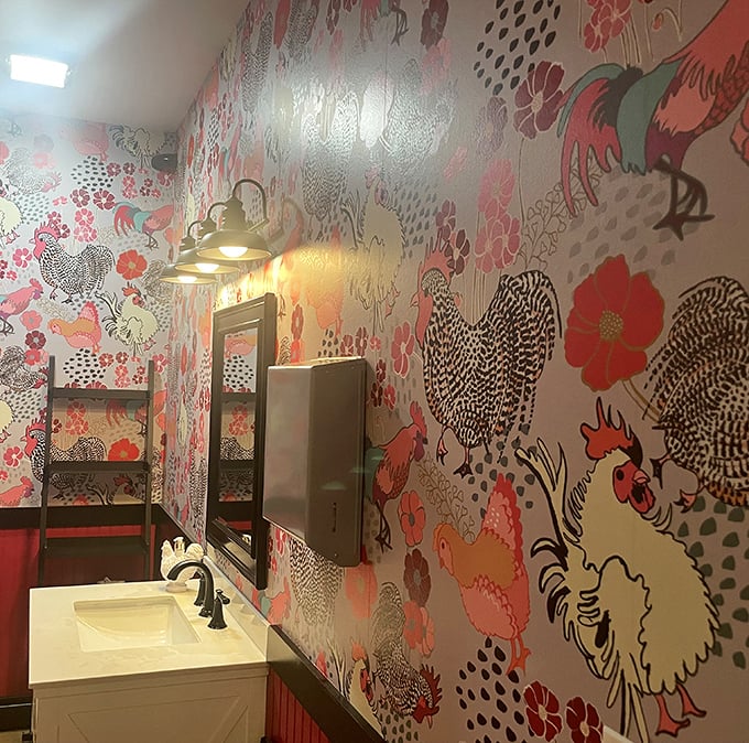 Even the restroom wallpaper tells a story&mdash;whimsical chickens and flowers that remind you where those perfect eggs originated.