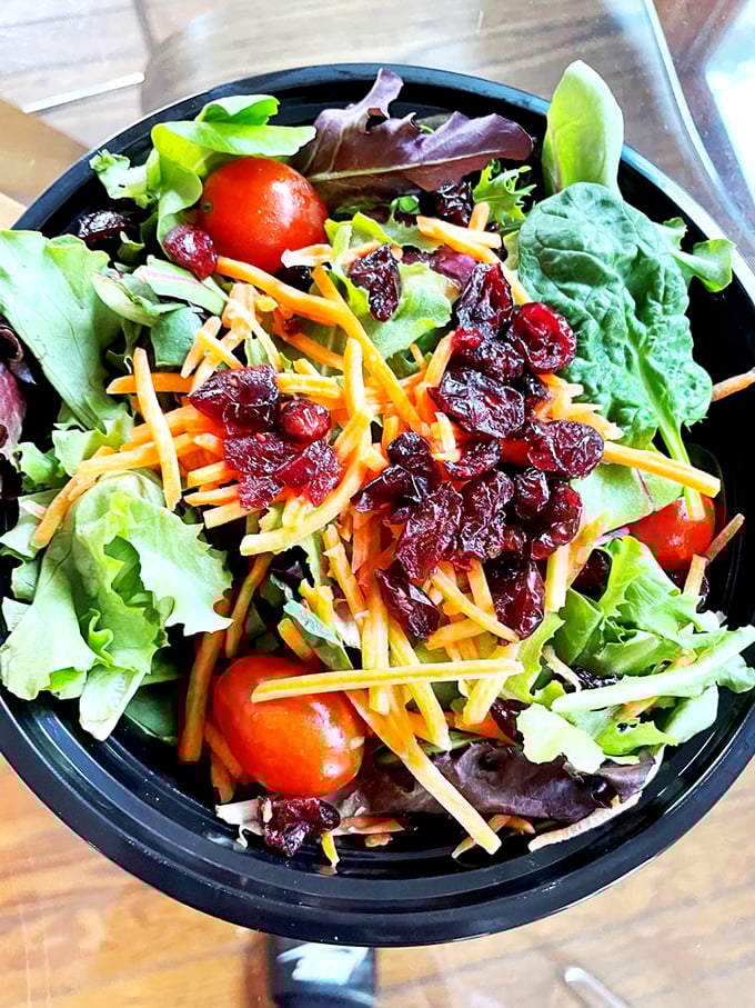 Even the salad looks happy to be here, bringing fresh relief to your smoke-saturated taste buds.