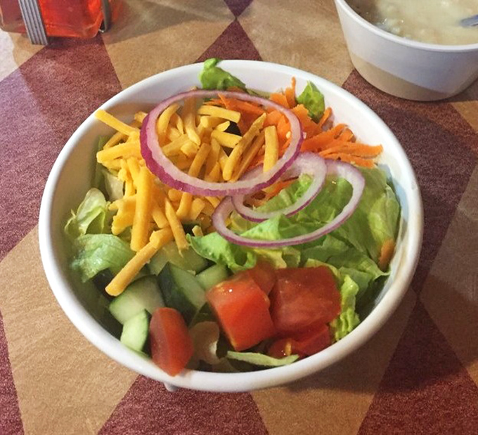 Even the salads here get the royal treatment, proving that fresh and colorful can hold their own alongside barbecue royalty.