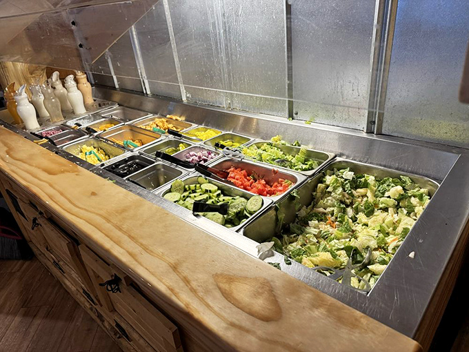 A salad bar that understands its supporting role in the barbecue drama. Fresh, colorful, and patiently waiting while you contemplate a second helping of ribs.