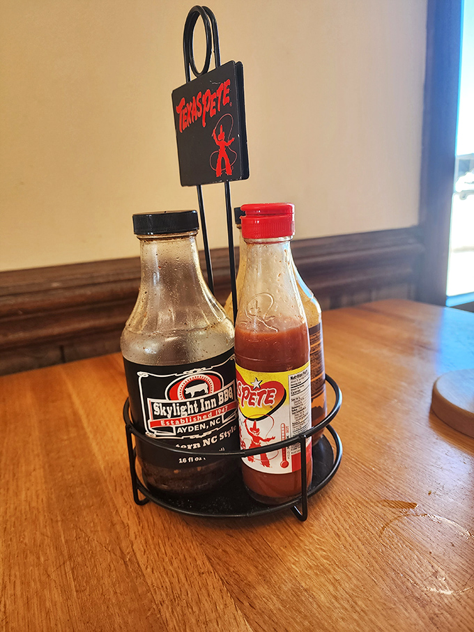 Choose your weapon: house sauce or Texas Pete's? Either way, that vinegar tang will elevate your pork to stratospheric heights.