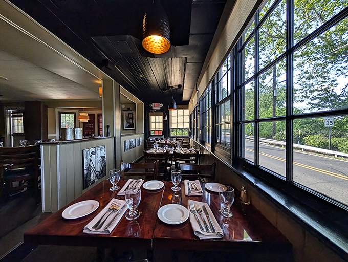 Window seats that frame the outside world like a painting, turning an ordinary meal into dinner and a show.