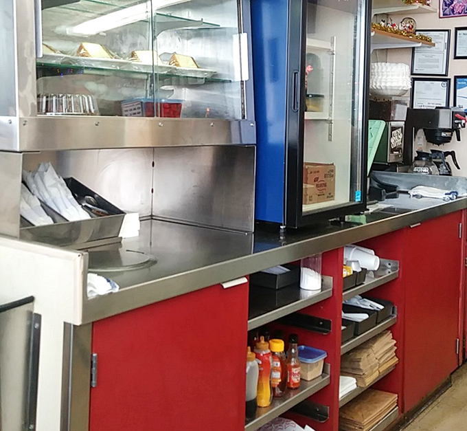 Behind these red cabinets lies the organized chaos of a diner kitchen&mdash;the engine room of comfort food creation.