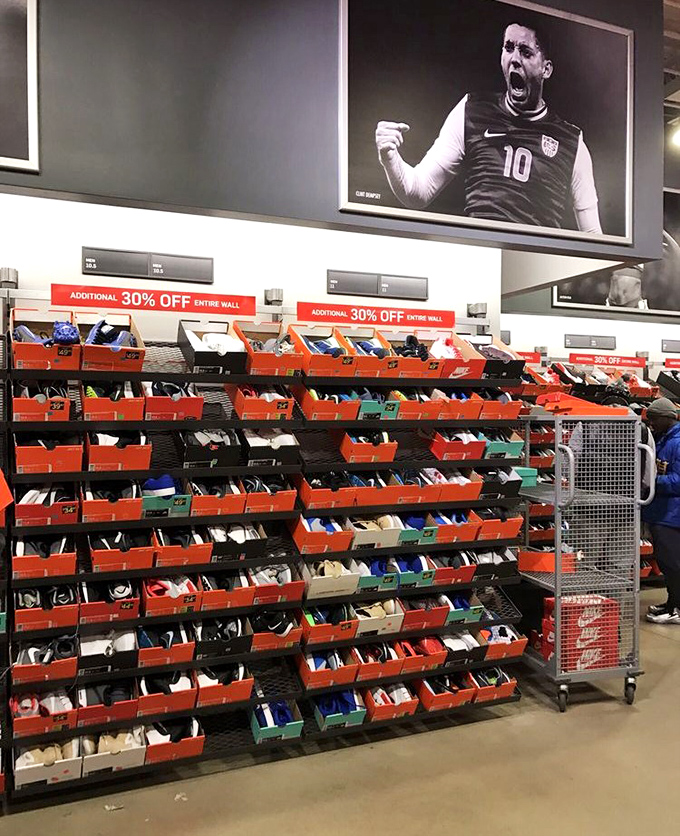 The wall of shoes at Nike speaks to our souls—and soles. An athletic footwear buffet where restraint goes to die.