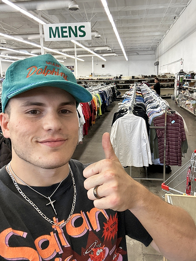 The universal thrift store thumbs-up – the international symbol for "I just found designer jeans for eight bucks!"