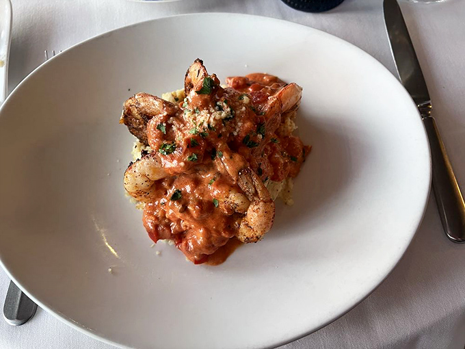 These shrimp aren't just resting on their grits&mdash;they're lounging luxuriously like they've checked into a five-star resort of creamy deliciousness.