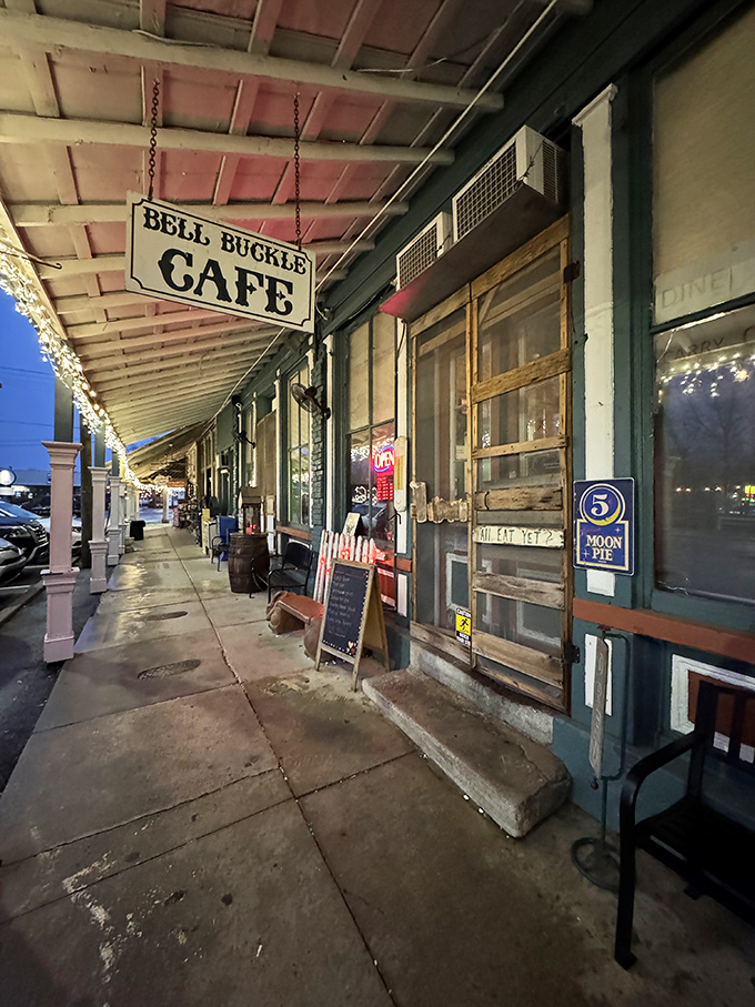 Night falls softly on Bell Buckle's sidewalks, where the caf&eacute;'s hanging sign swings gently and a Moon Pie sign hints at sweet traditions.