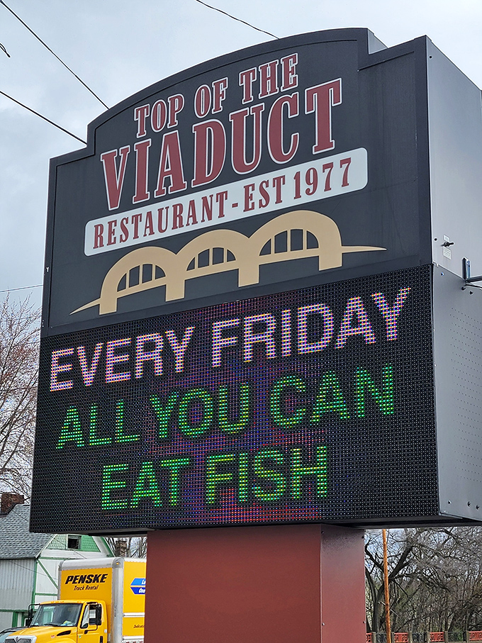 The sign promises "ALL YOU CAN EAT FISH" on Fridays, which is either a challenge or a blessing, depending on your appetite.