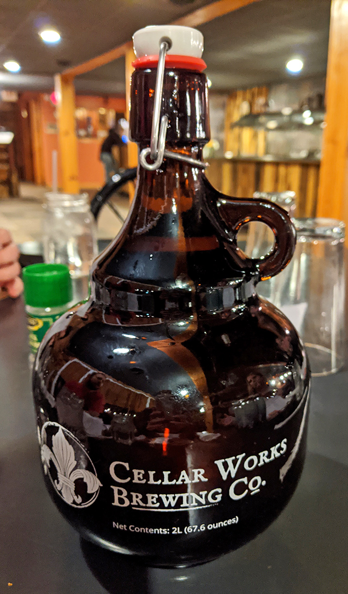 A growler of local brew waiting to complement those smoky flavors. Because great BBQ deserves a worthy liquid companion.