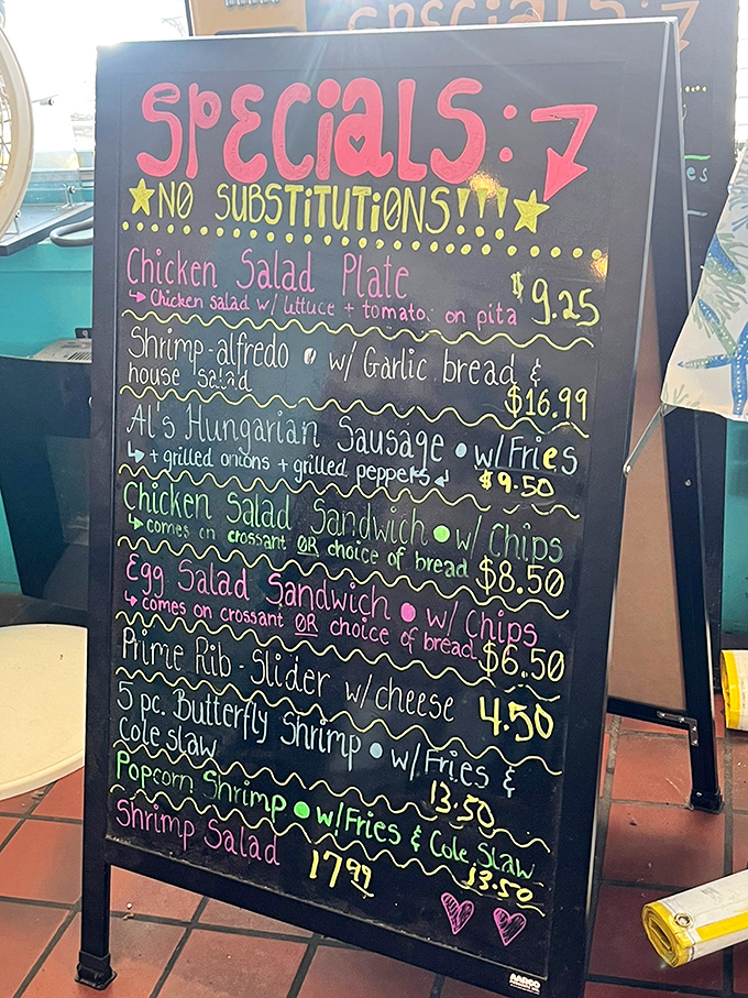 The specials board written in rainbow chalk is like a treasure map where X marks the spot for Hungarian sausage with grilled peppers and onions.