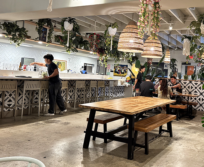 Where the magic happens. The staff moves with practiced efficiency behind a counter adorned with those eye-catching geometric tiles that Instagram dreams are made of.