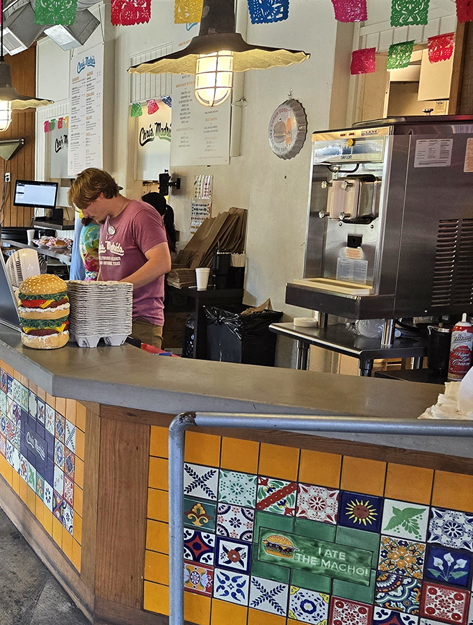 Behind every great burger is someone who knows exactly what they're doing. The calm before the cheese storm.