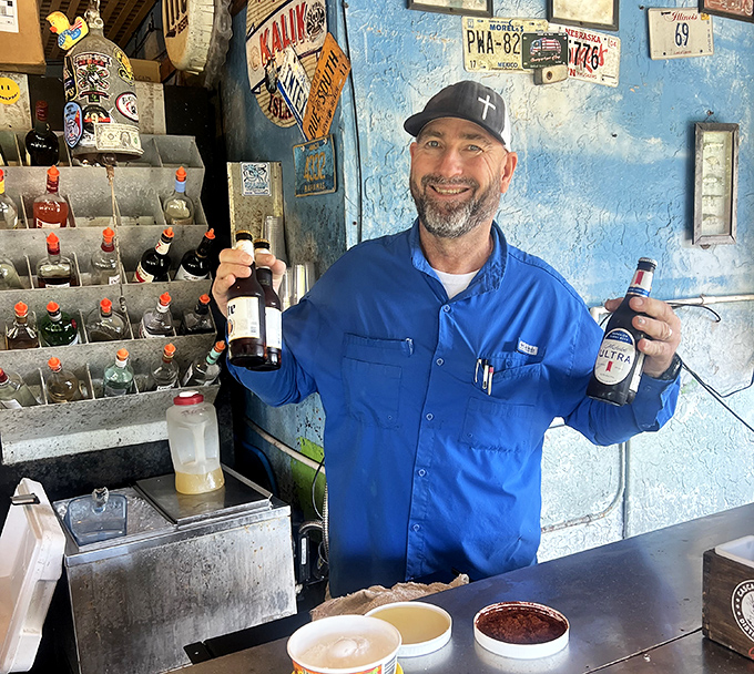 The staff at Alabama Jack's serve happiness with a side of seafood, proving the best hospitality doesn't need fancy uniforms or rehearsed speeches.