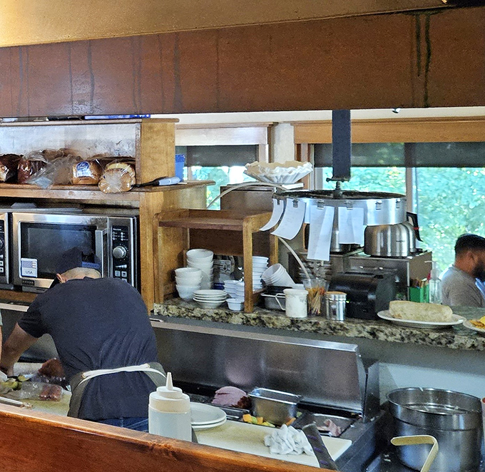 Where breakfast magic happens &ndash; the bustling kitchen line where your chicken fried steak dreams are crafted with practiced hands and secret knowledge.