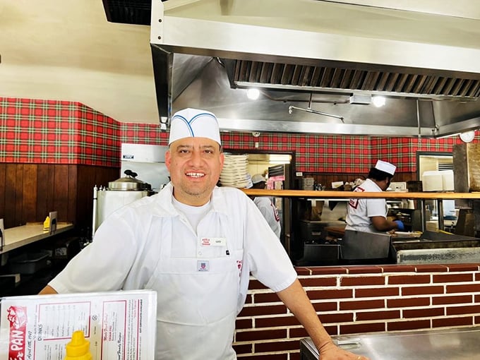 The white paper hat isn't just tradition&mdash;it's a crown for burger royalty. These culinary craftsmen have forgotten more about burgers than most chefs will ever know.
