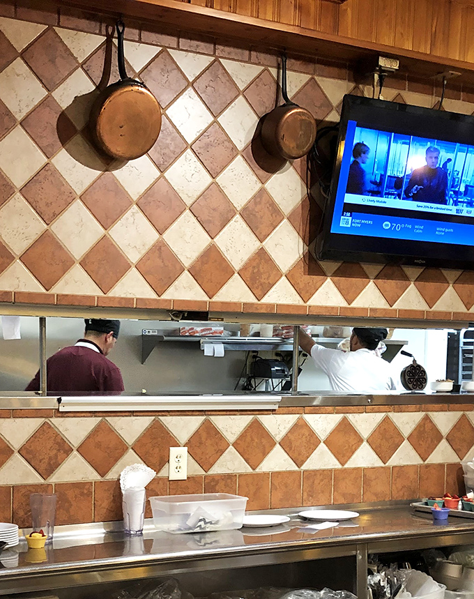 The open kitchen design isn't just trendy – it's dinner theater for breakfast, where skilled hands transform simple ingredients into morning masterpieces.