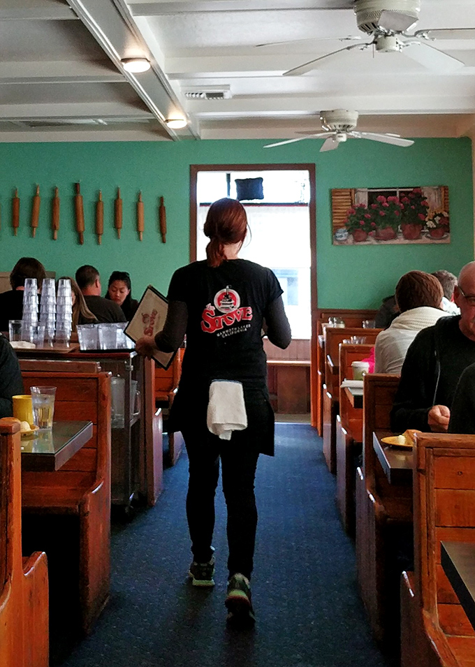 The servers move with the practiced grace of breakfast ballet dancers, menus in hand, ready to make your morning significantly better.