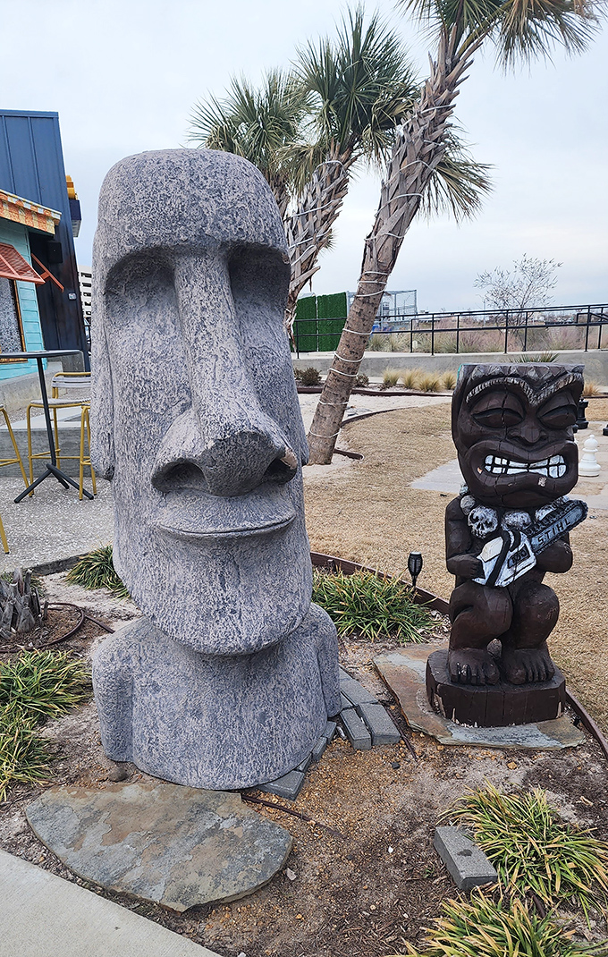Easter Island meets tiki culture outside the museum. These statues stand guard over a kingdom of quirky Texas creativity.