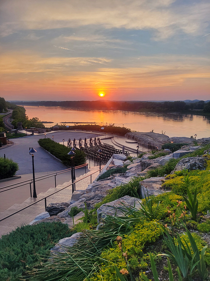A Missouri River sunset paints the sky in watercolor hues, creating the perfect backdrop for an evening of wine and contemplation.