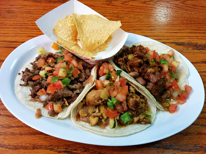 Tacos presented with the simplicity and confidence of a three-act play&mdash;each protein telling its own delicious story on a corn tortilla stage.