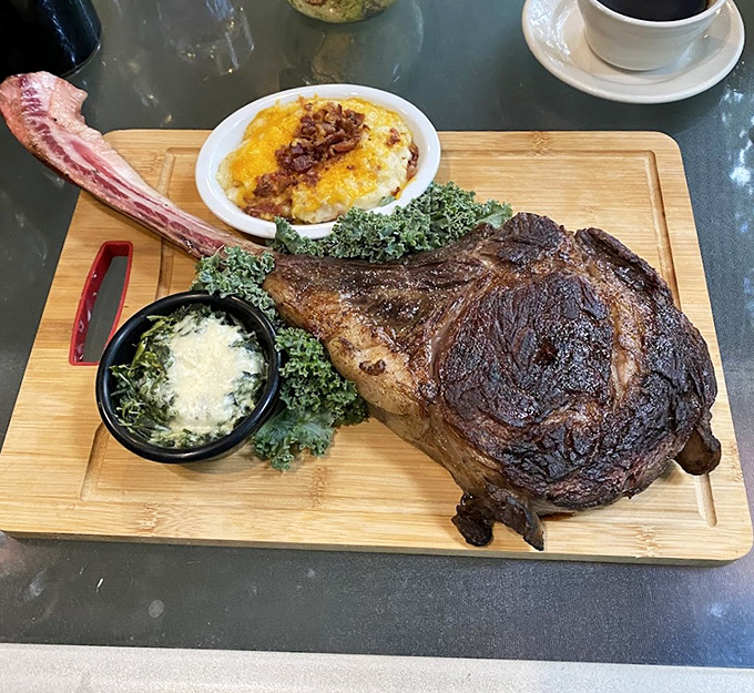 The tomahawk steak arrives like a prehistoric declaration of indulgence&mdash;a carnivore's fantasy that makes neighboring tables pause mid-conversation in collective awe.