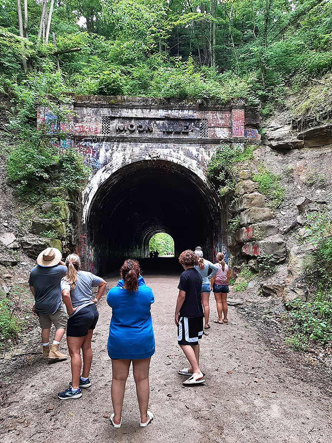 Groups of visitors approach with a mix of excitement and trepidation, drawn by stories of spectral brakemen and the Lavender Lady.