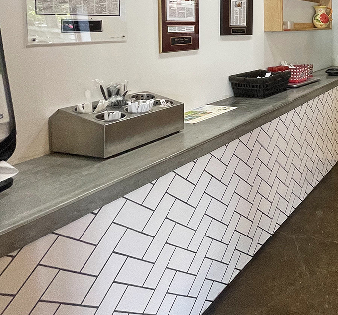 The herringbone-tiled counter adds a touch of style to the no-frills operation, where function clearly leads but form isn't completely forgotten.