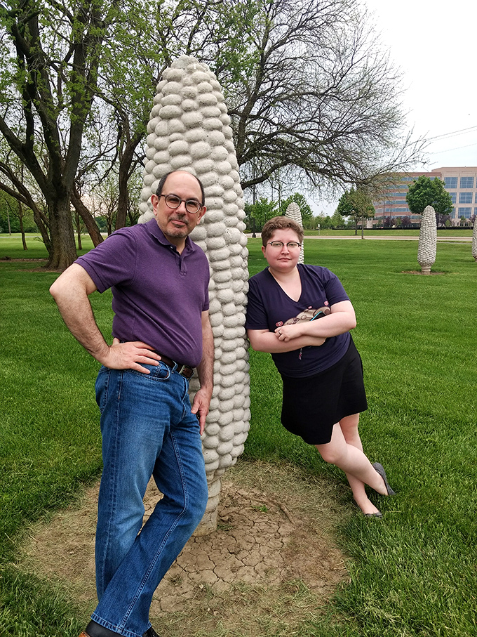Visitors pose with their favorite corn stalk, creating memories that are both completely normal and utterly bizarre at the same time. 