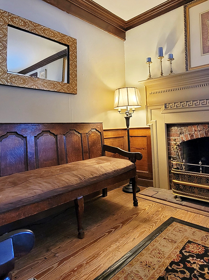 The waiting area with its antique bench and fireplace isn't just functional&mdash;it's a time machine to a more gracious era.