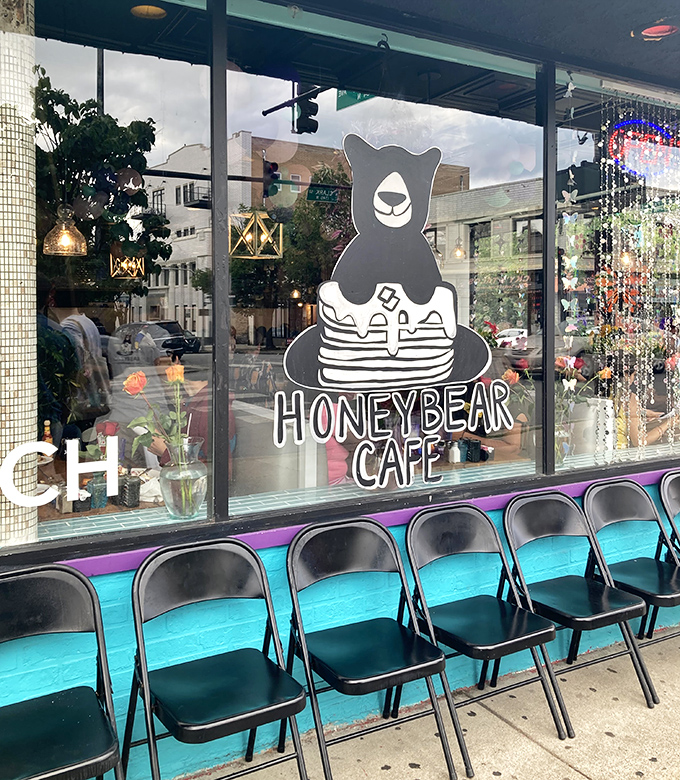 Window seats and the cafe's bear mascot welcome sidewalk wanderers, promising pancake salvation just steps away from the Chicago hustle.