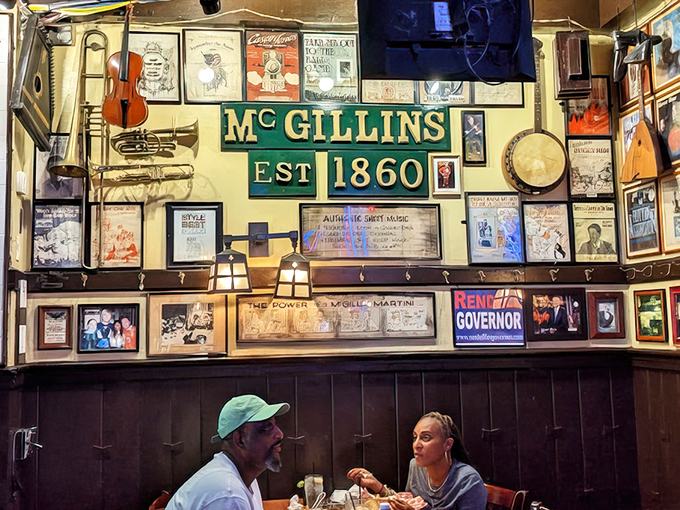 Every inch of wall space tells Philadelphia stories—musical instruments, vintage signs, and photographs creating a visual time capsule of city pride.