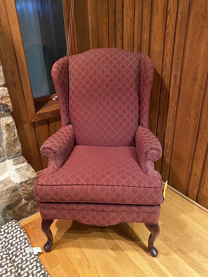 This burgundy wingback chair isn't just seating&mdash;it's a throne waiting for its next monarch. Perfect for reading or judging the neighbors.