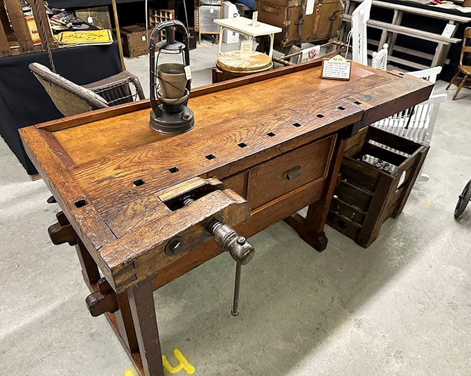 This craftsman's workbench tells stories of projects past, its worn oak surface and vintage tools representing American craftsmanship that has stood the test of time.