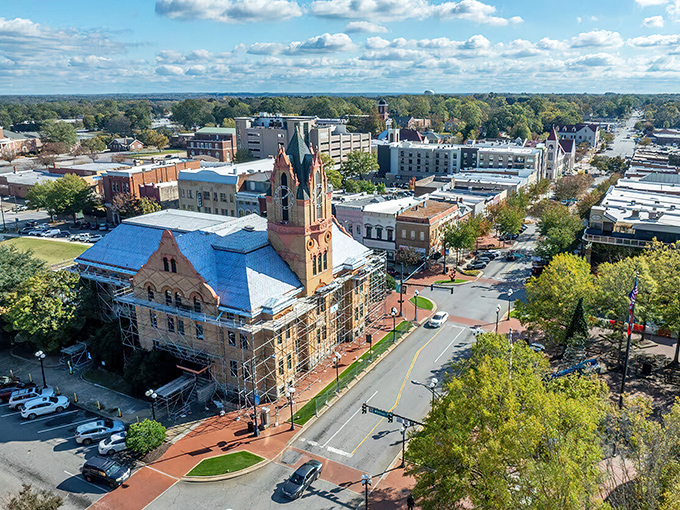 Anderson's church spire reaches skyward against a perfect Carolina blue, anchoring the town in both faith and history.