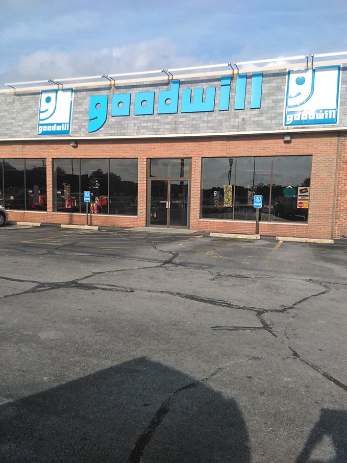 Goodwill's cheerful blue signage brightens up this shopping center. The smiley face logo isn't the only thing that'll make you grin!