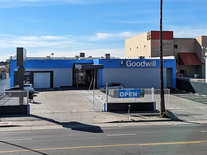 Goodwill's bright blue building on Sunset Boulevard stands out like a sapphire in the urban landscape.