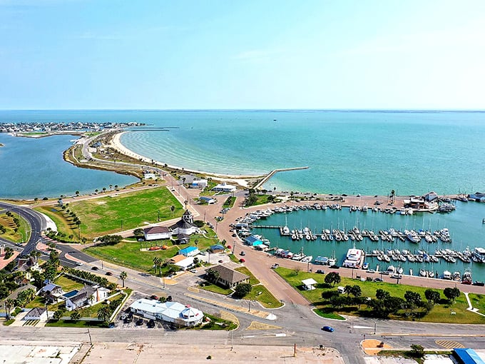 Rockport's marina showcases coastal living where fishing boats and fair prices create an angler's affordable paradise dream.