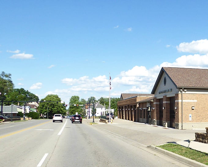 This charming town spreads like a green quilt stitched together with tree-lined streets.