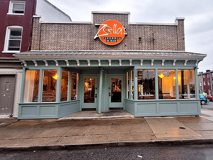 Zella's mint-green storefront brightens the corner like their pizzas brighten your day &ndash; with unexpected charm. 