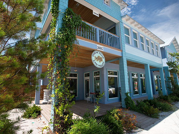 Colorful beach cottages line Anna Maria Island's streets, creating a pastel paradise that screams "vacation mode activated."