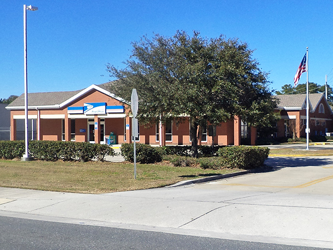 Stars, stripes, and small-town service! Macclenny's Post Office stands ready to connect this community to the wider world.