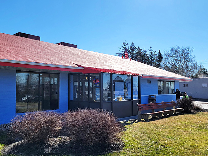 Sunshine highlights this blue-and-red Delaware landmark where breakfast is served all day because some traditions are too good to schedule.