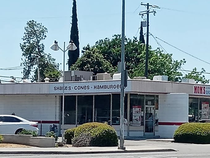 Behind these windows, Mom's serves nostalgia on a bun &ndash; classic burgers that remind you why sometimes the simplest things are the most satisfying.