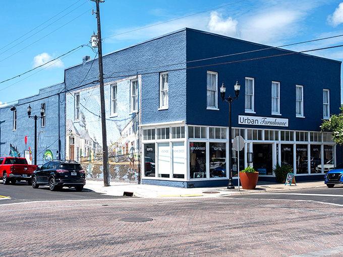 Urban Farmhouse stands proudly at Palatka's crossroads. Its vibrant blue facade boldly declares "beige buildings are for people who fear joy."
