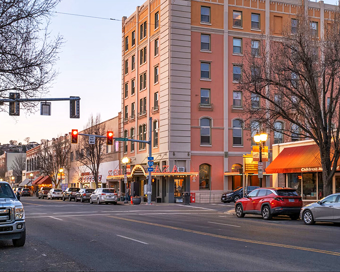 The warm glow of Pendleton's downtown invites evening strolls where every storefront seems to say, "Retirement at its finest happens here."