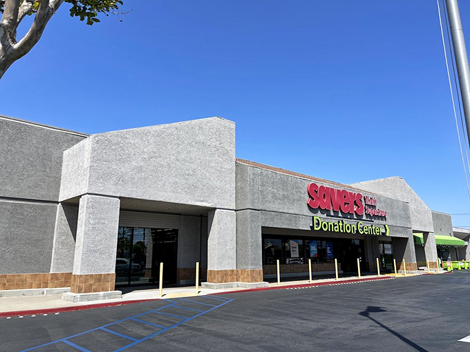 The no-nonsense exterior of Savers hides a wonderland of organized thrifting inside. That green donation center entrance is the gateway to giving!