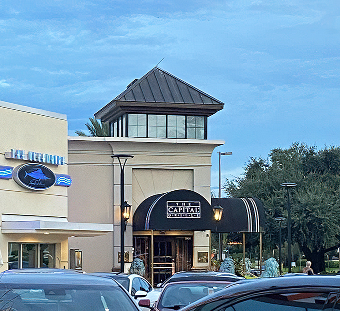 The Capital Grille's stately entrance promises an experience as refined as their perfectly marbled ribeyes.